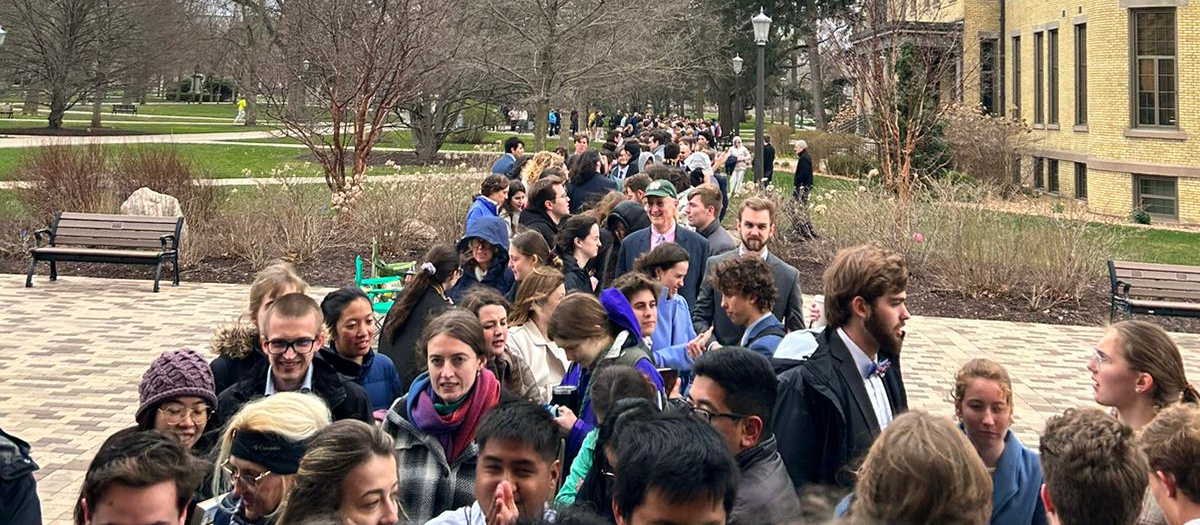 Hundreds Wait for Easter Vigil Mass - Irish Rover